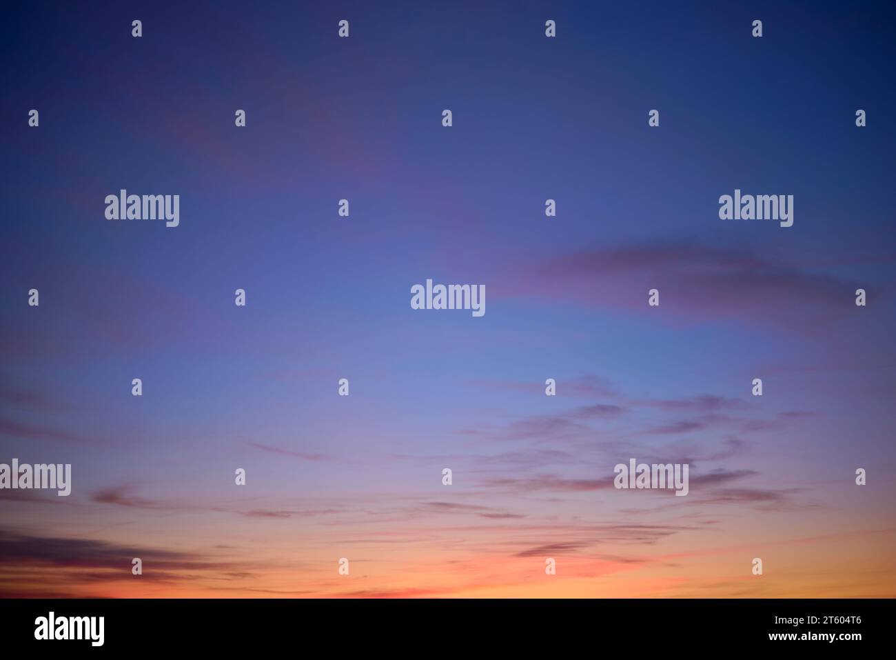 Sunset. Heaven, orange sky Sun rays Wallpaper Clouds Stock Photo - Alamy