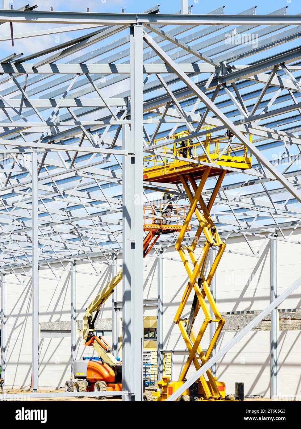 Complex large volume steel frame structure assembly using self ...