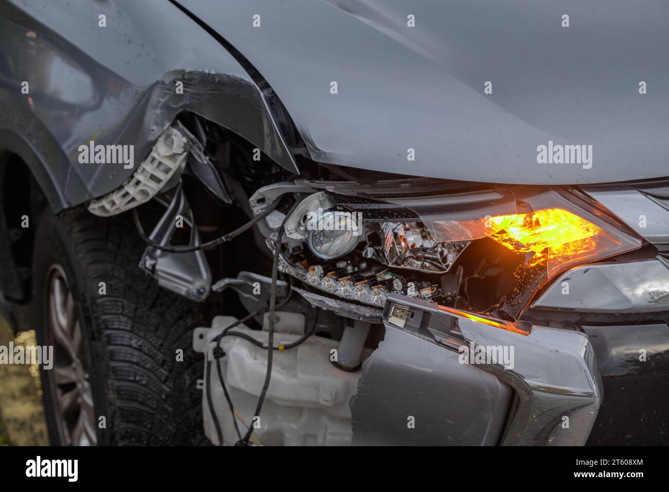 Accidental damage to the front right of a car Stock Photo - Alamy
