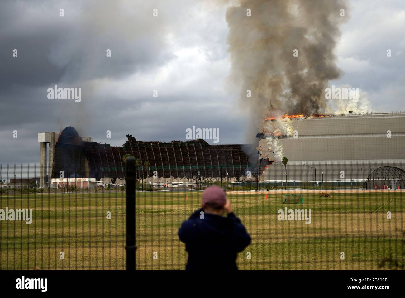 A historic blimp hangar burns in Tustin, Calif., Tuesday, Nov. 7, 2023 ...