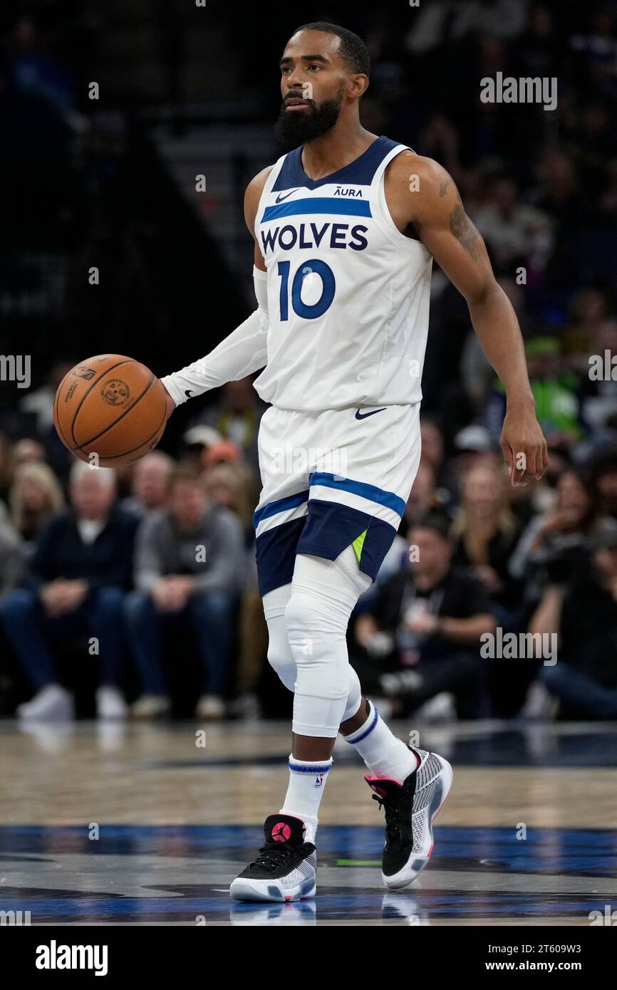 Minnesota Timberwolves guard Mike Conley (10) dribbles down the court ...