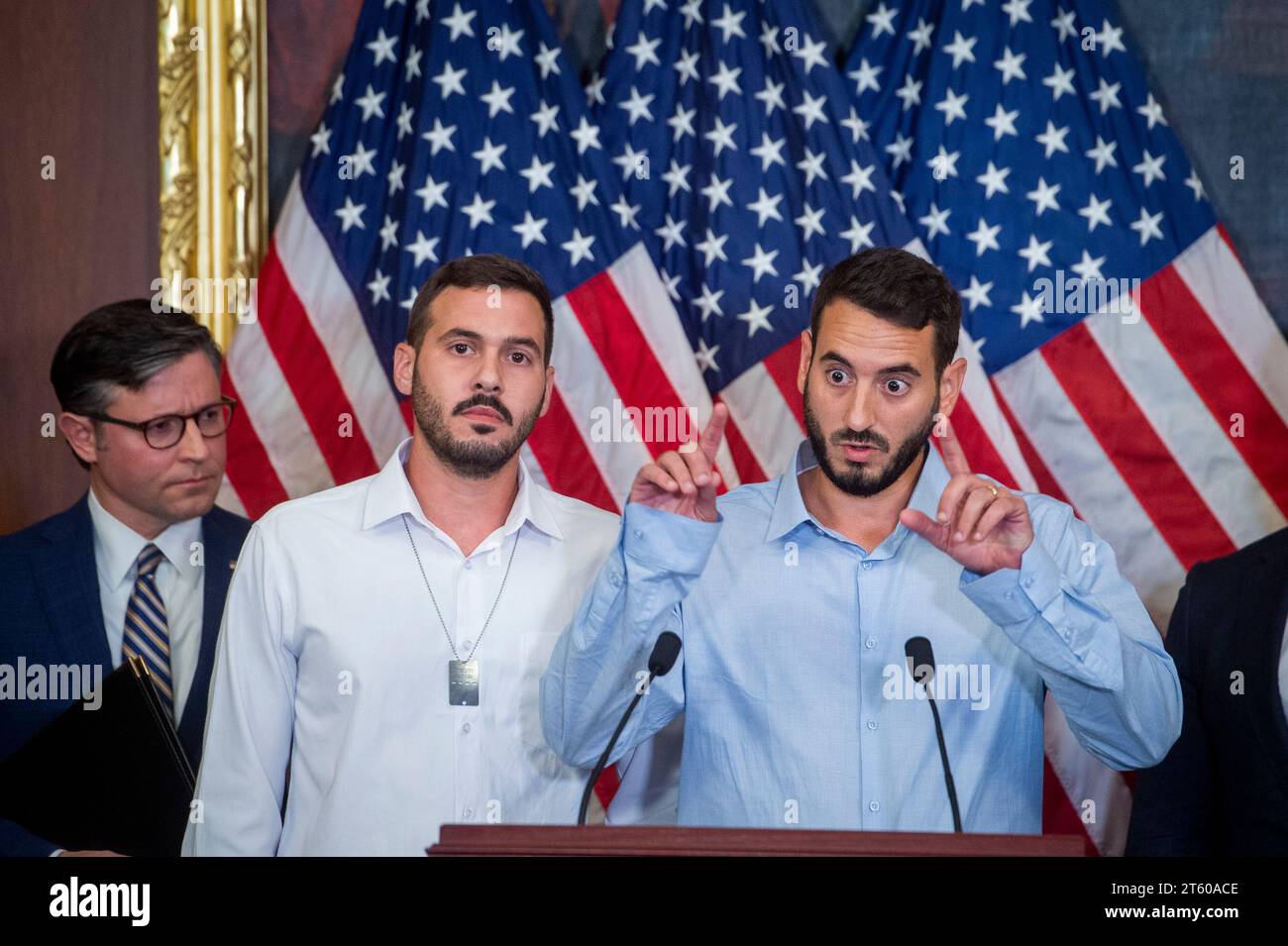 Yonatan Lulu Shamriz, center, talks about his brother, Hamas hostage ...