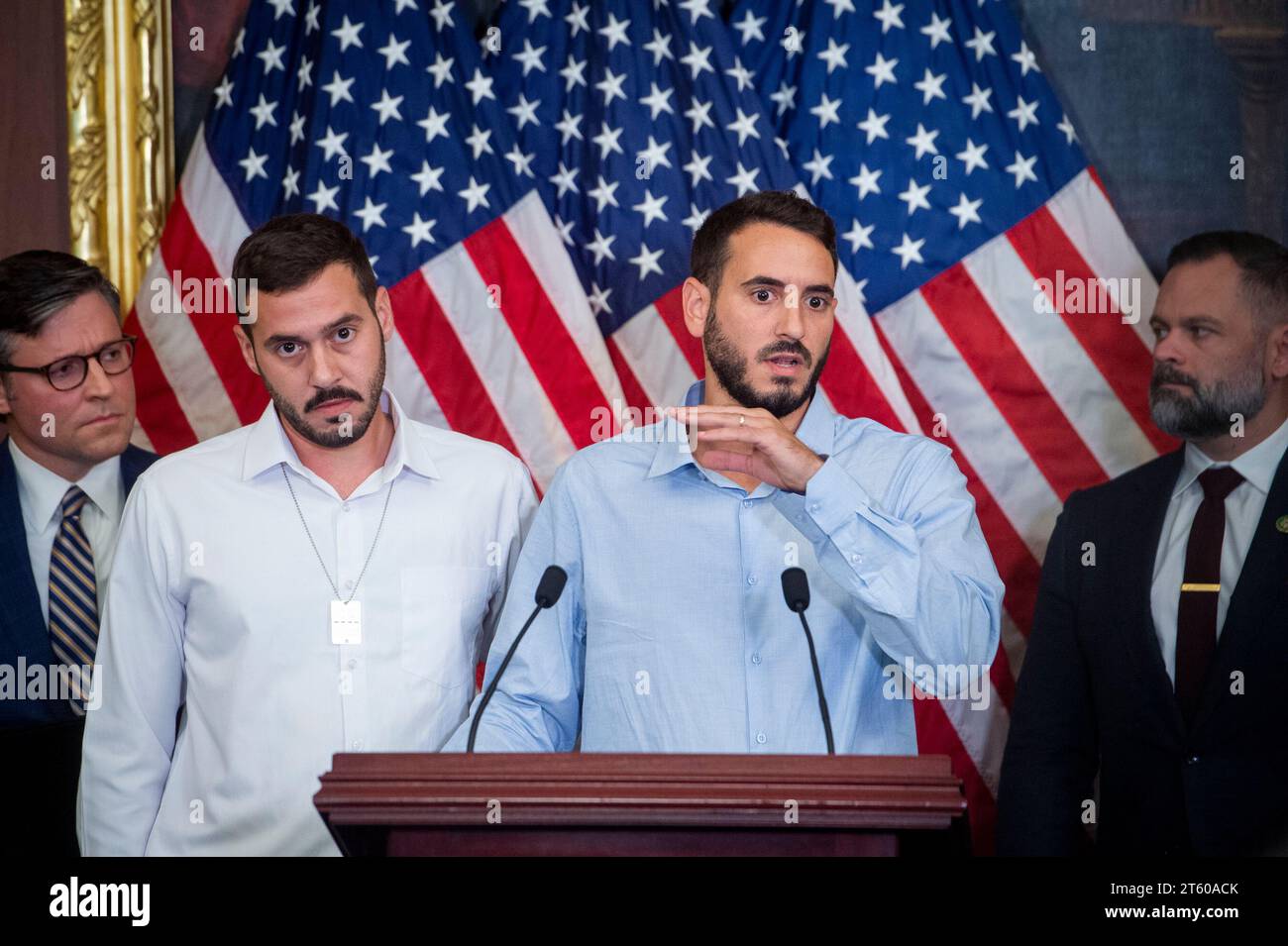 Yonatan Lulu Shamriz, center, talks about his brother, Hamas hostage ...