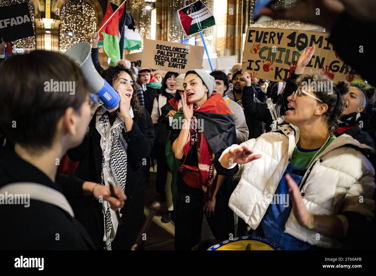 AMSTERDAM - Protesters are holding a sit-in in the central hall of ...