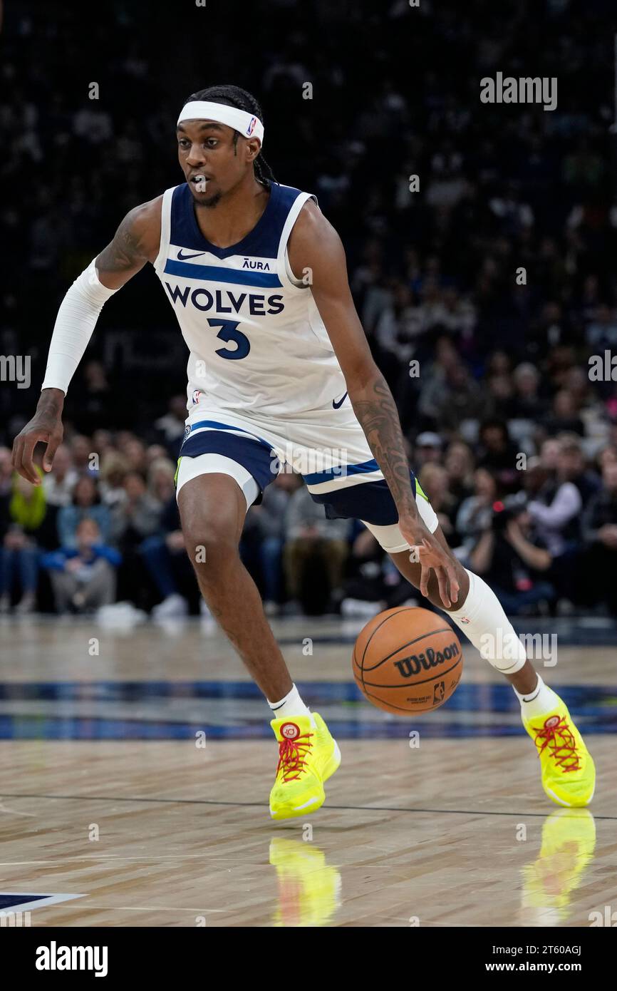 Minnesota Timberwolves forward Jaden McDaniels (3) dribbles down the ...
