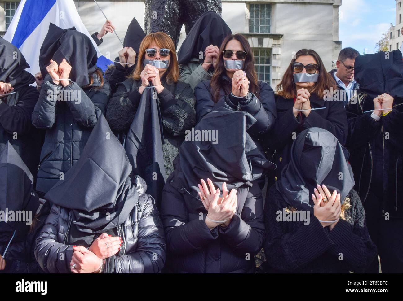 London, England, UK. 7th Nov, 2023. Protesters have their hands tied ...