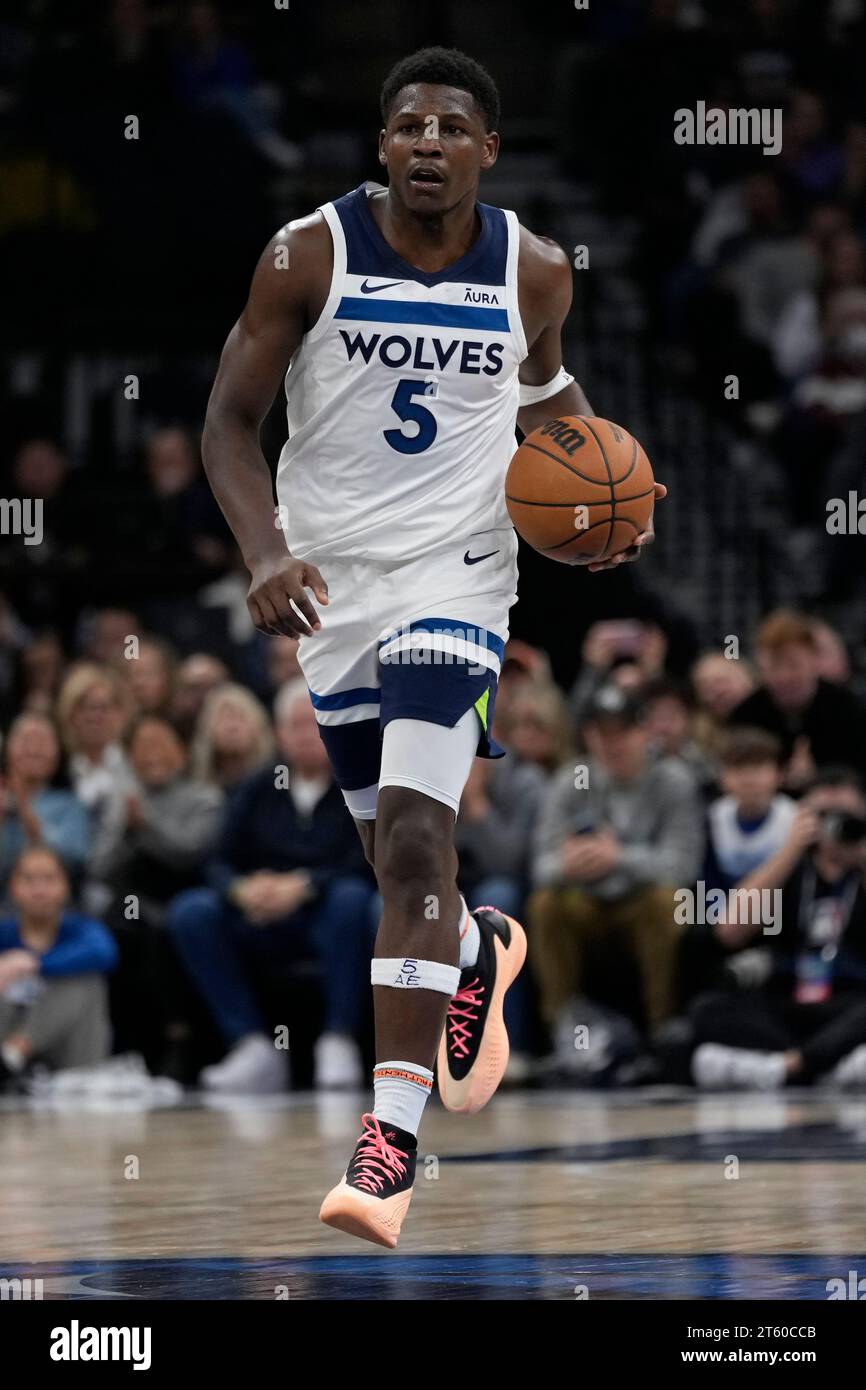 Minnesota Timberwolves guard Anthony Edwards (5) dribbles down the ...