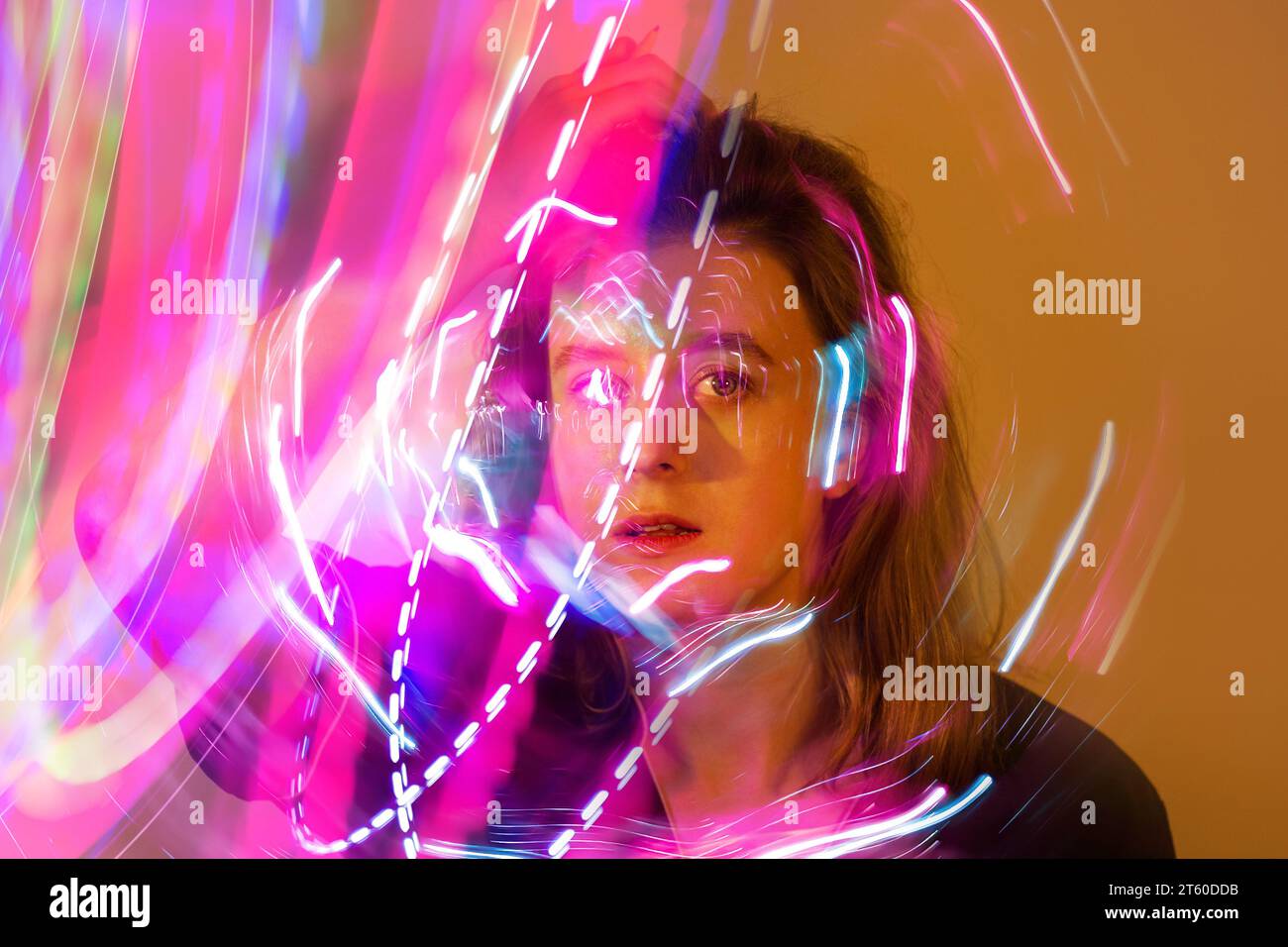 Beautiful Alone Girl On Background Of Neon Searchlight Light Young Happy Smiling Woman On