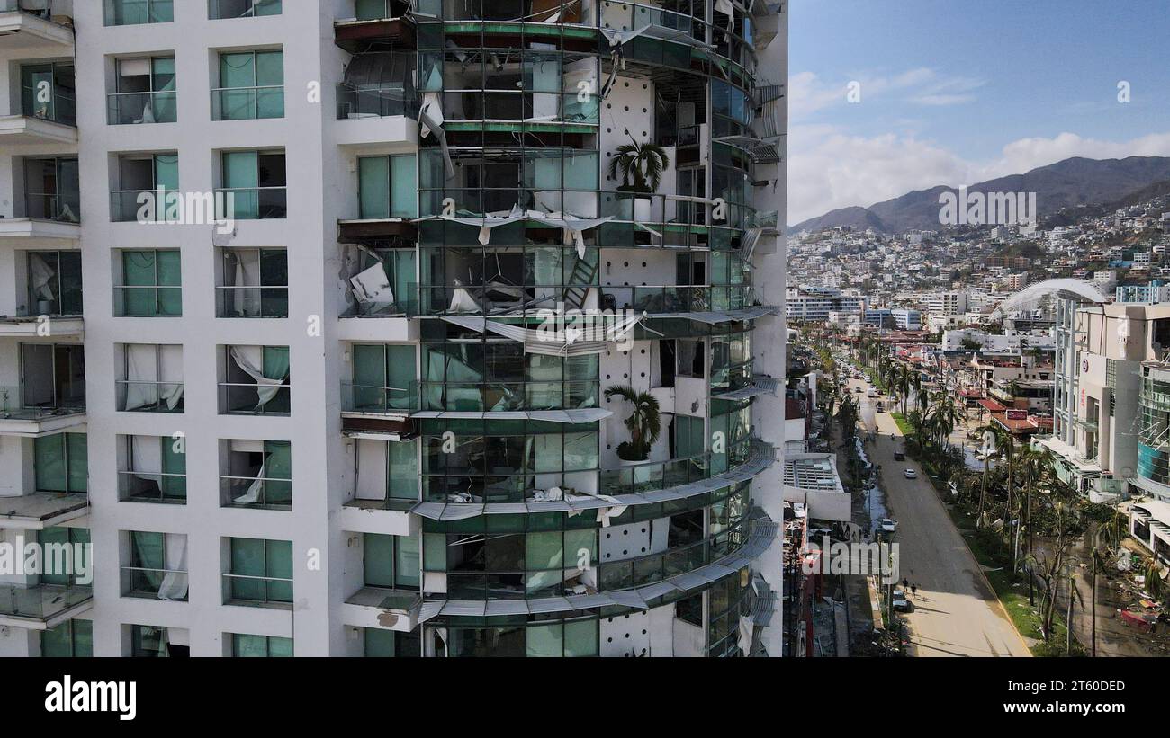 FILE - Damaged buildings stand after Hurricane Otis ripped through ...