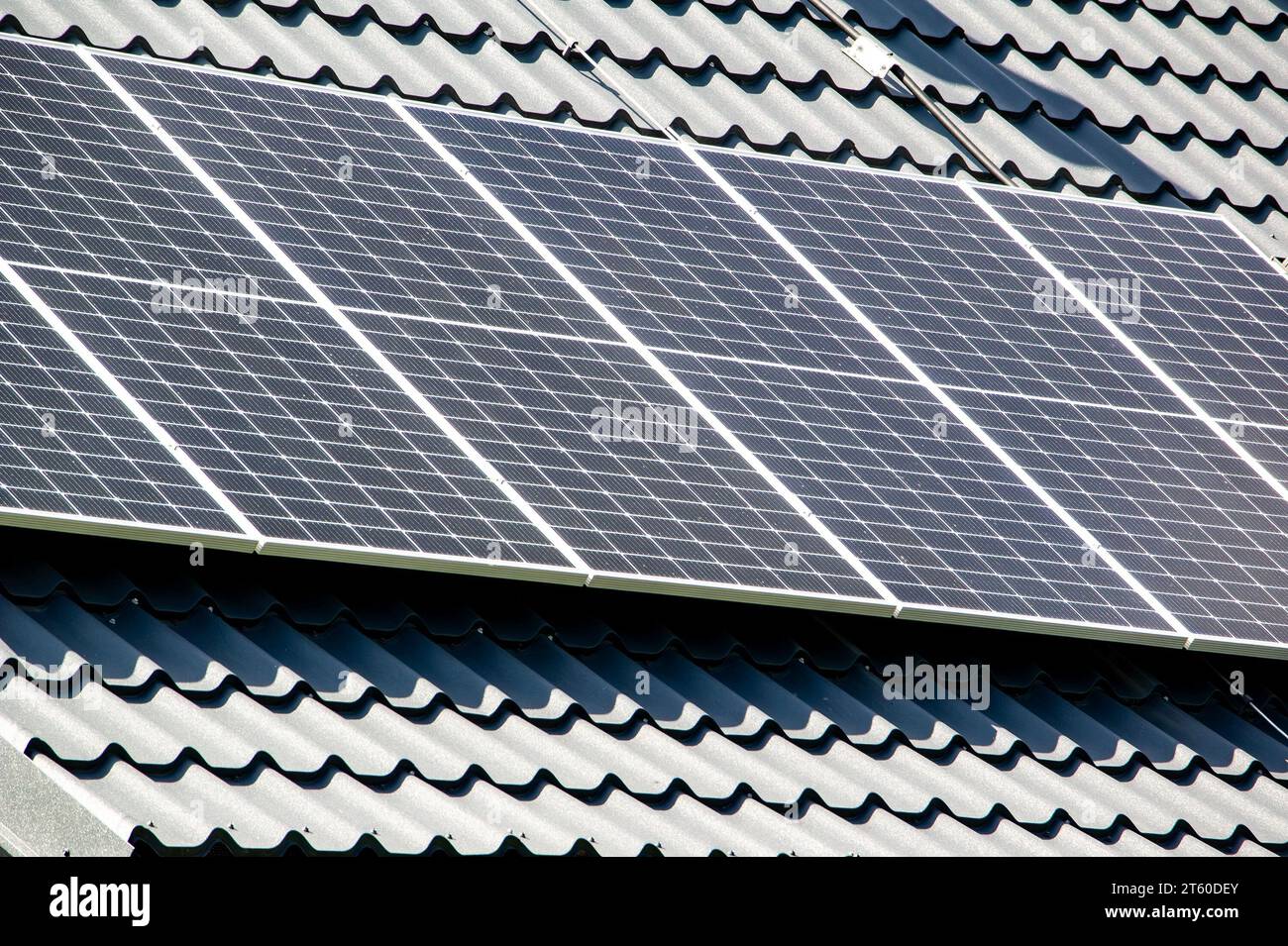 Solar panels on a modern roof, renewable source of electrical energy ...