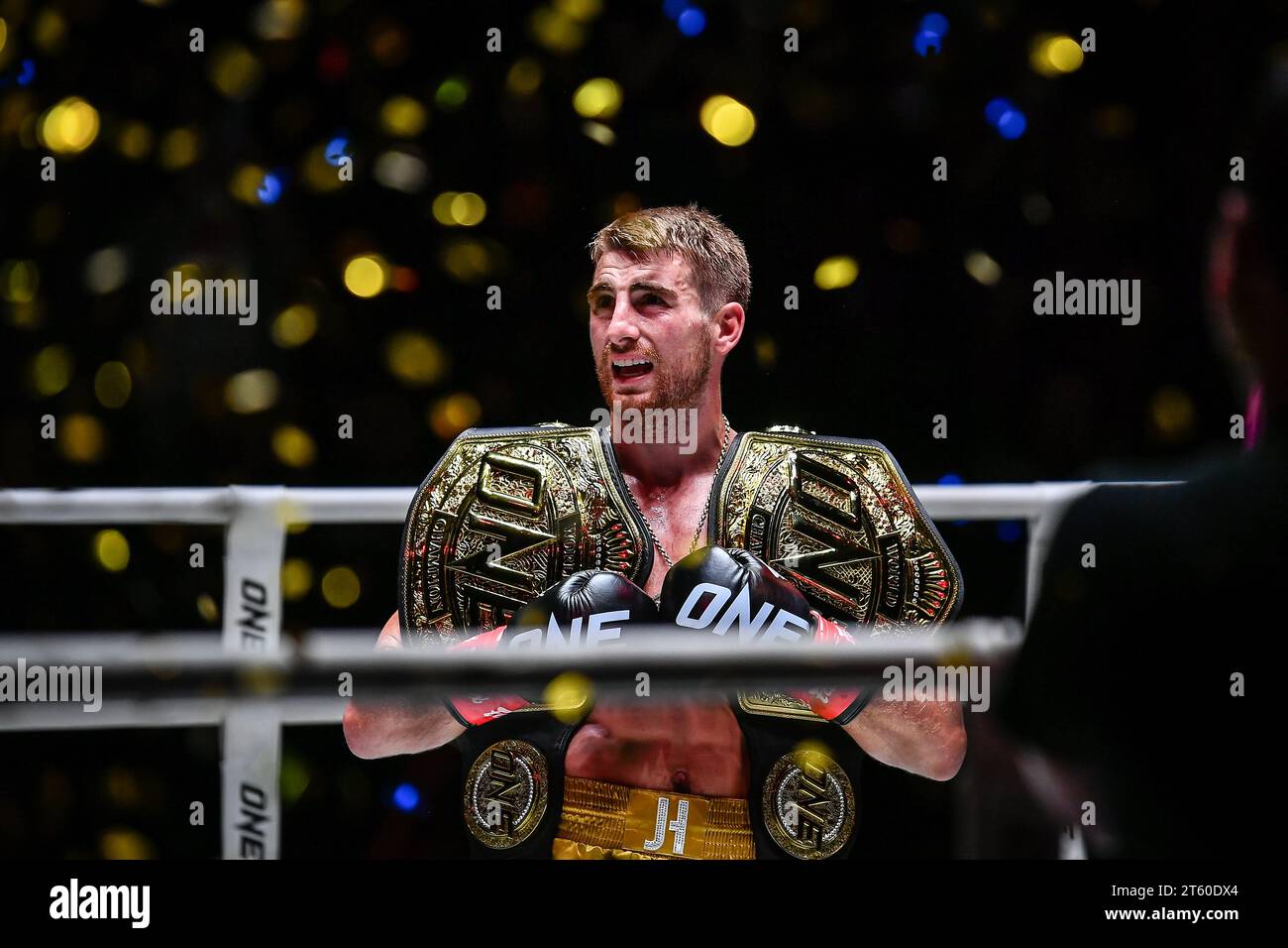 Jonathan Haggerty of England seen carrying title boxing belts during ...