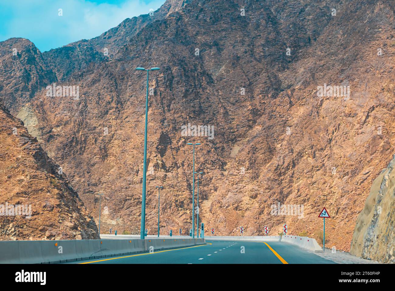 Fujairah mountains, extension of Omani Al Hajar mountain range. Cloudy ...