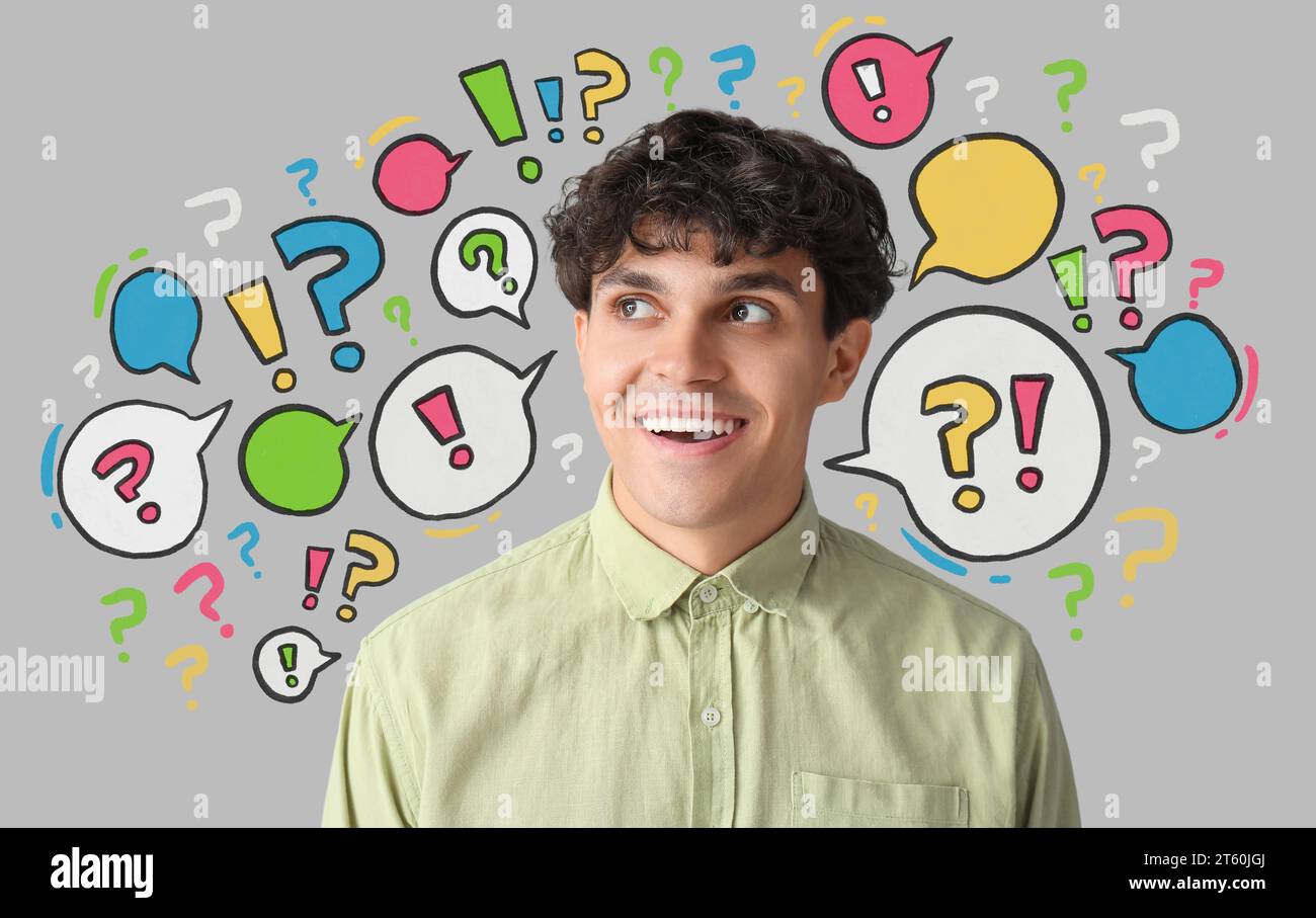 Young man and many speech bubbles with question and exclamation marks ...