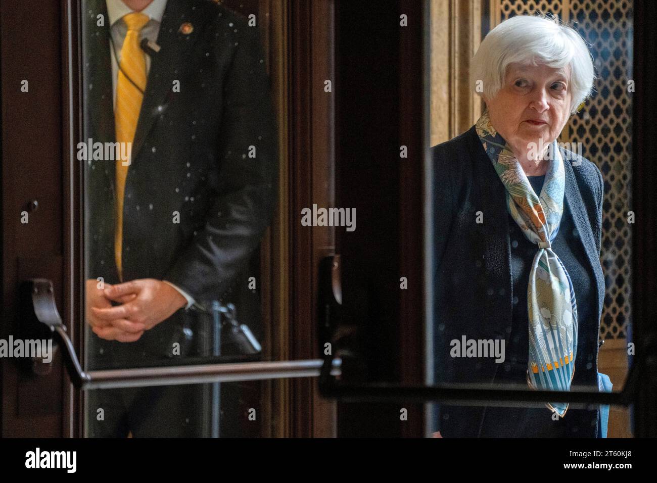 Treasury Secretary Janet Yellen waits outside the room to speak at the ...