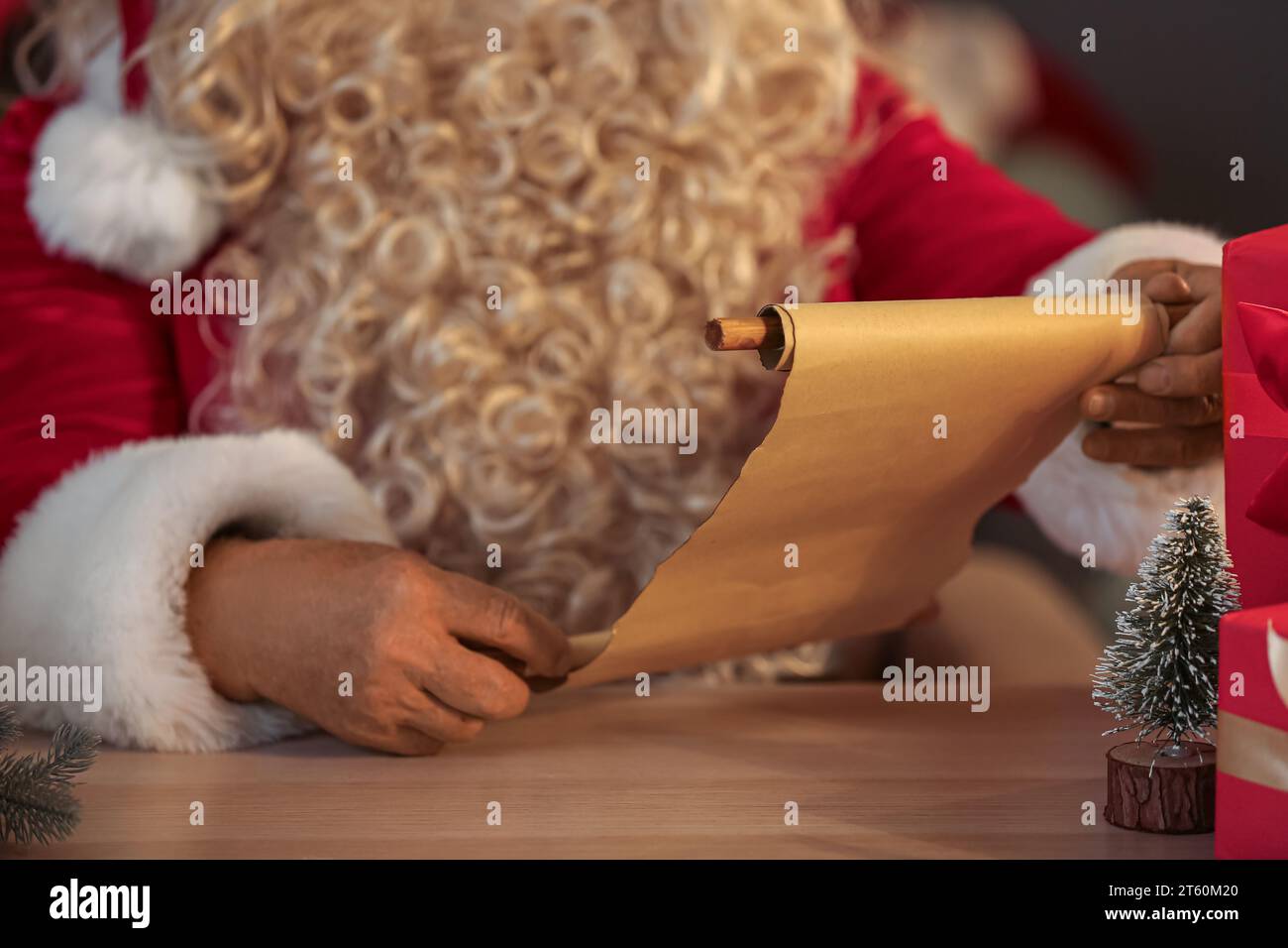 Santa Claus reading letter at home on Christmas eve, closeup Stock ...