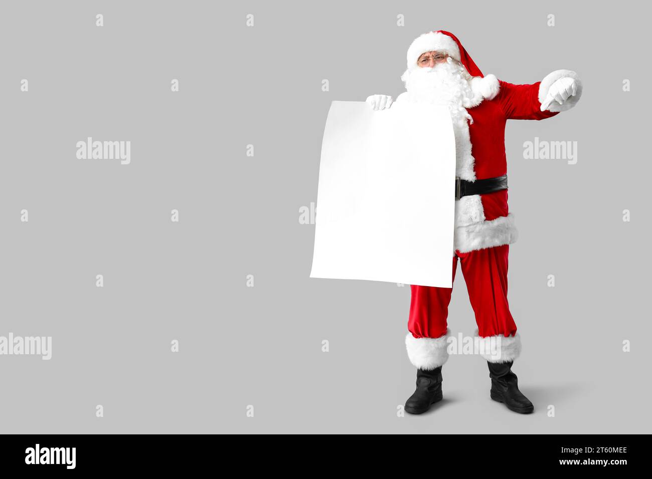 Santa Claus with blank poster showing dislike on grey background Stock ...