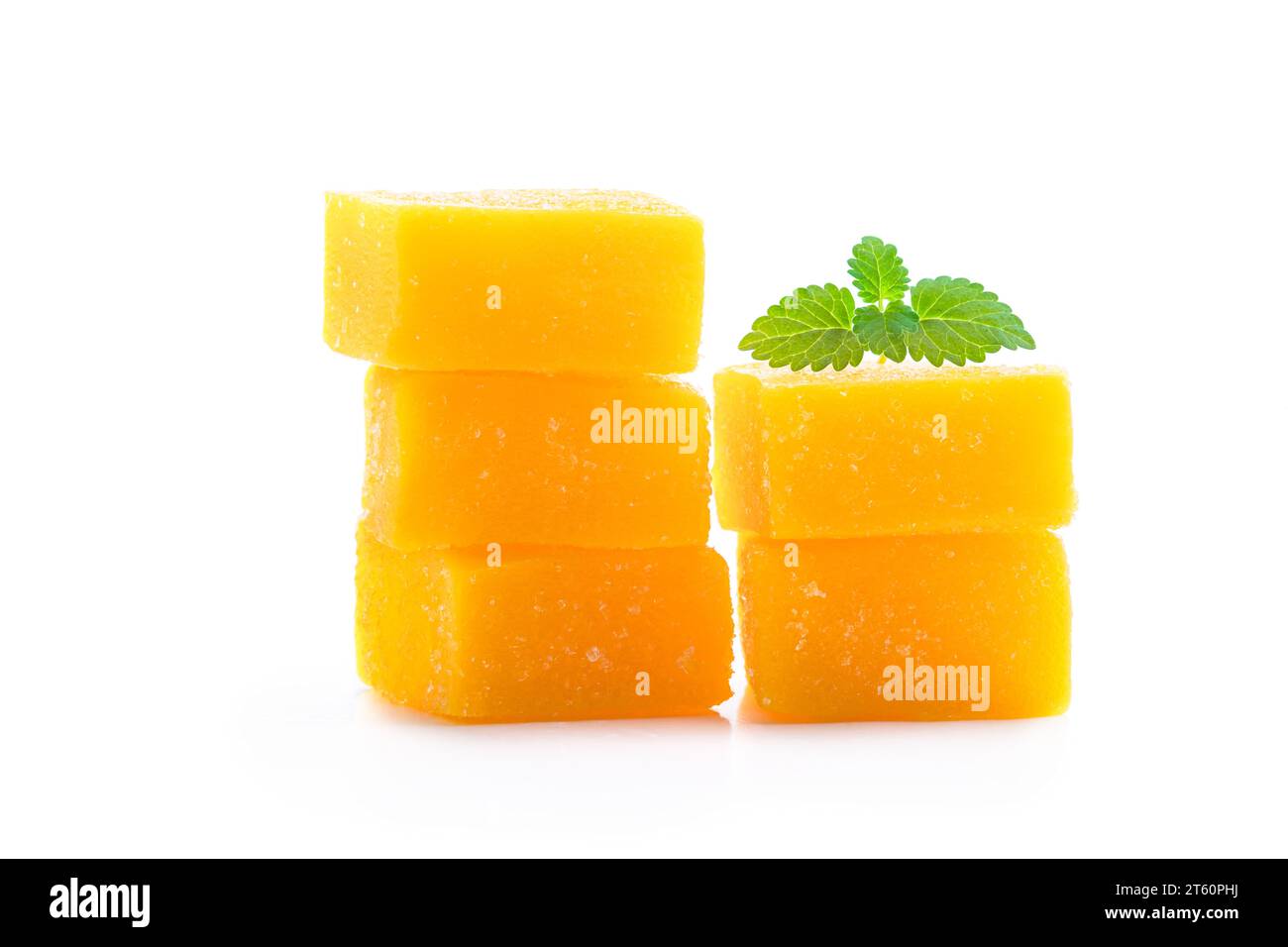 Mango jelly candies on white background Stock Photo - Alamy
