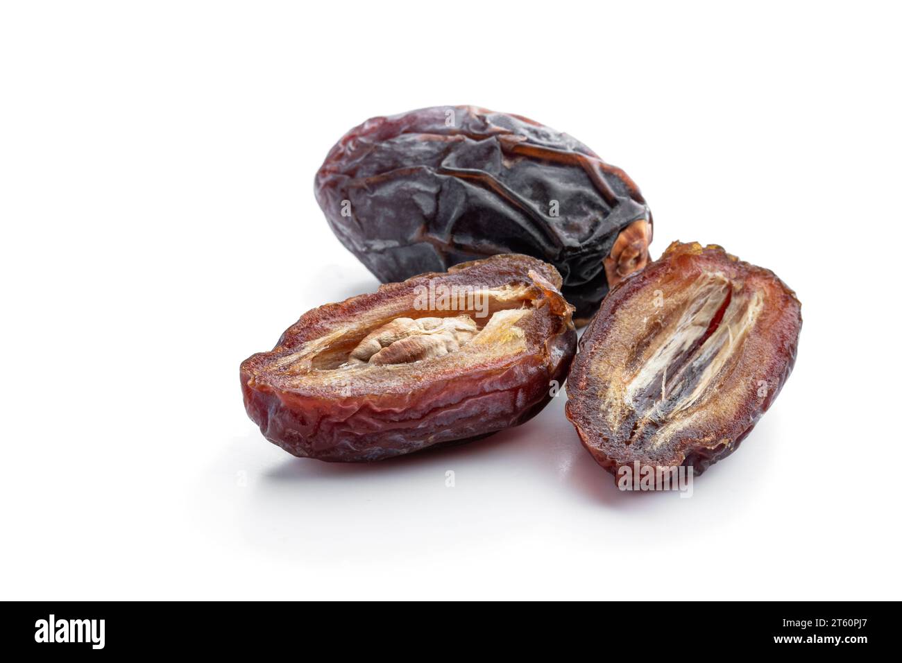 Dried dates fruits top view on white background Stock Photo - Alamy