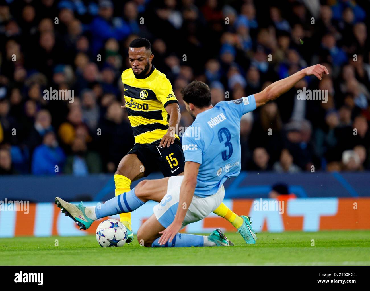 Manchester City's Ruben Dias tackles BSC Young Boys' Meschak Elia ...