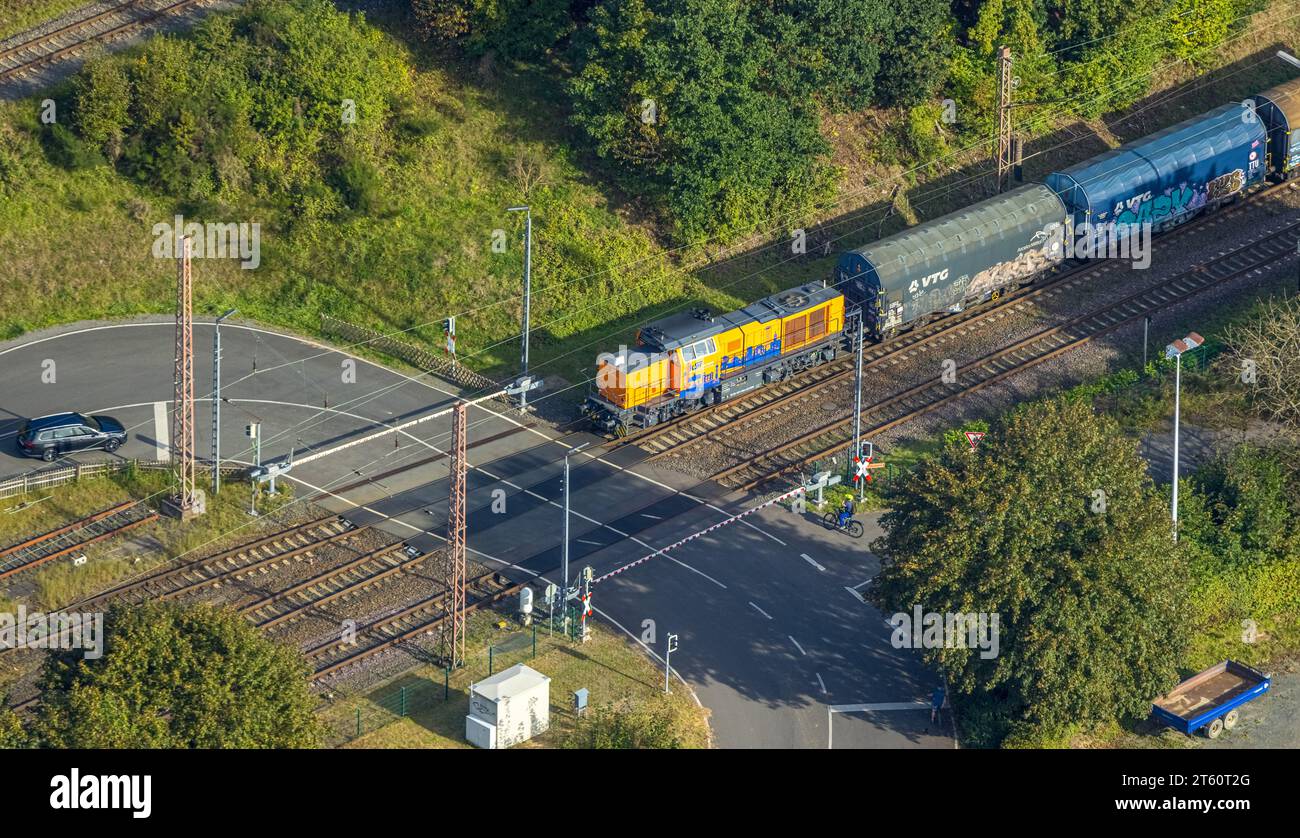 Aerial view, Closed level crossing with painted freight train ...