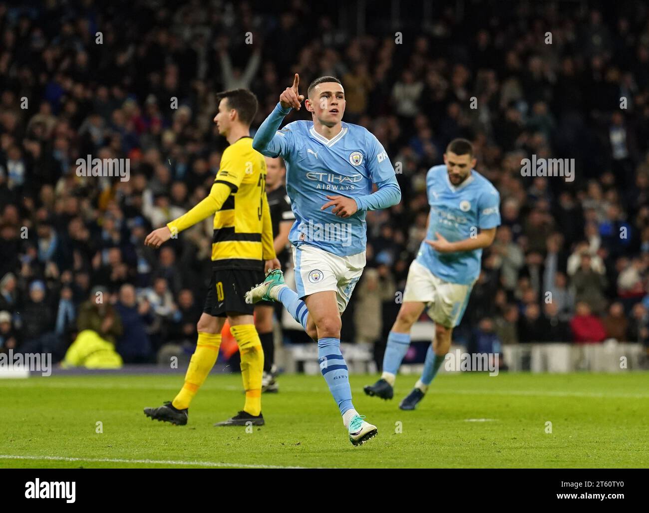 Manchester City's Phil Foden celebrates scoring their side's second ...