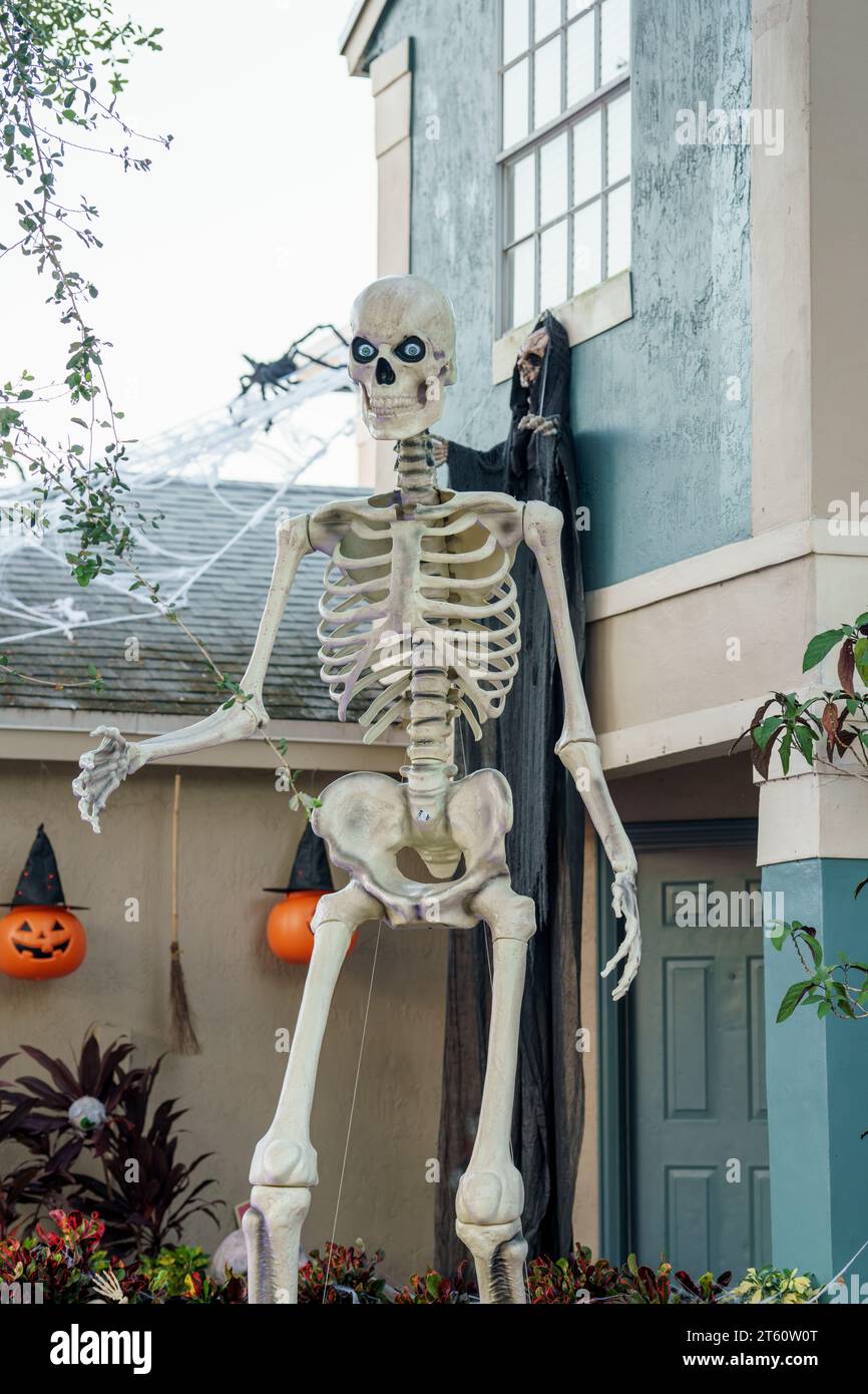 Large skelaton at a house for Halloween with digital eyes Stock Photo ...