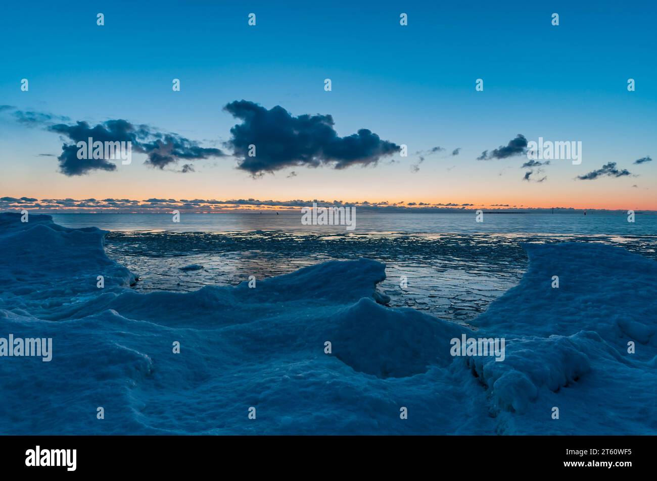 The frozen shores of Gulf of Bothnia in winter in Finland with packed ...