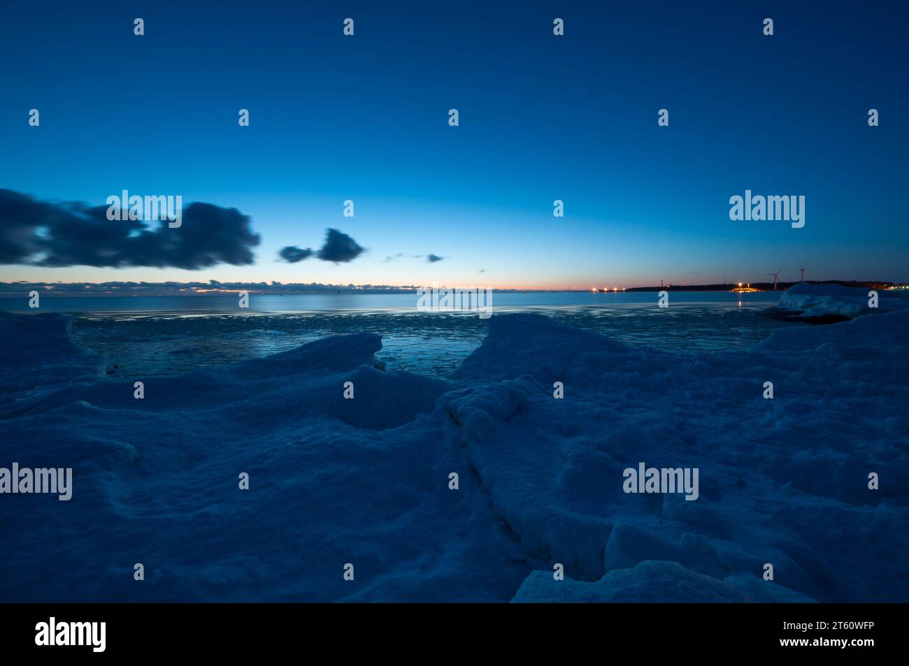 The frozen shores of Gulf of Bothnia in winter in Finland with packed ...