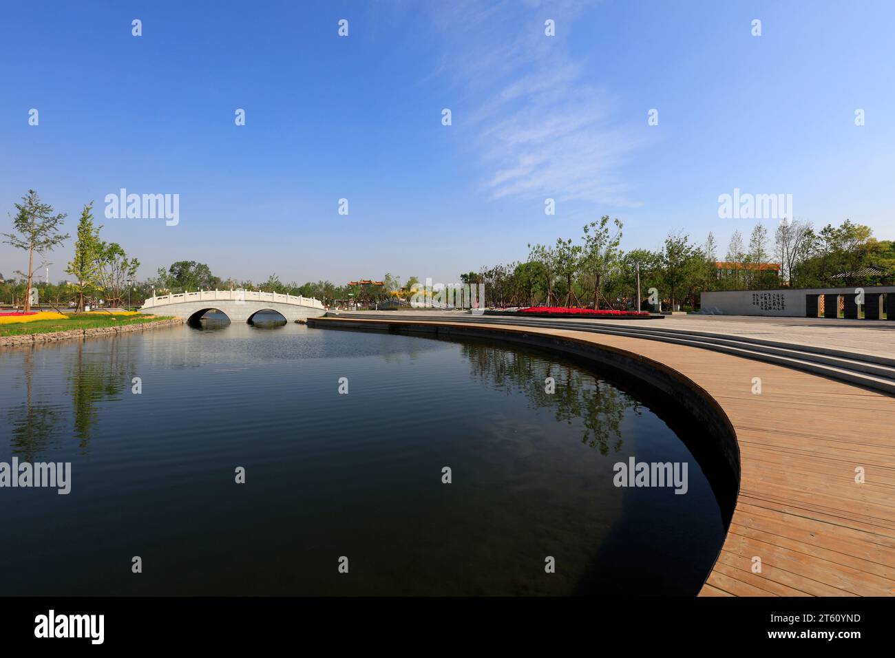Double arch stone bridge and wooden platform Stock Photo - Alamy