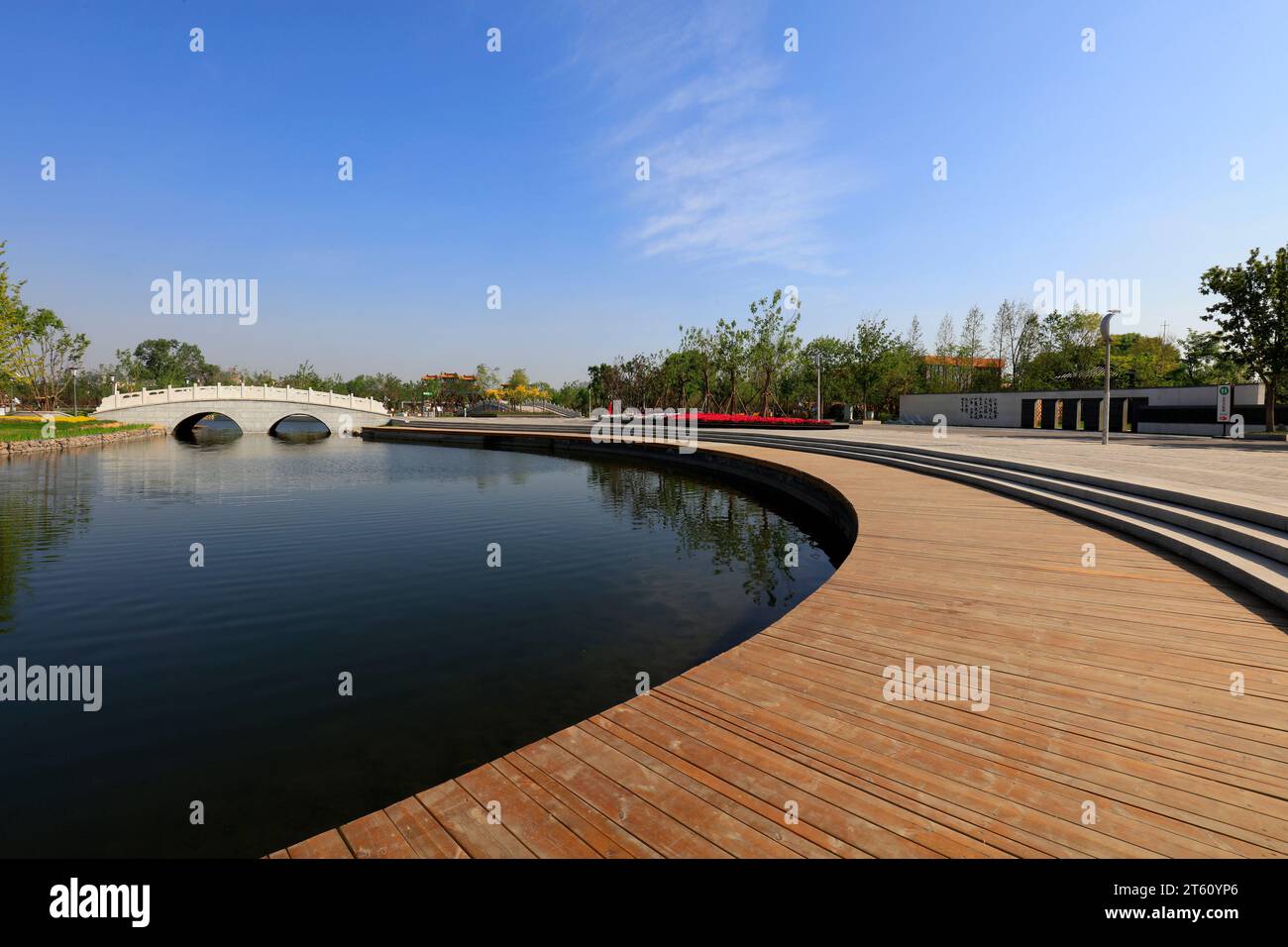 Double arch stone bridge and wooden platform Stock Photo - Alamy