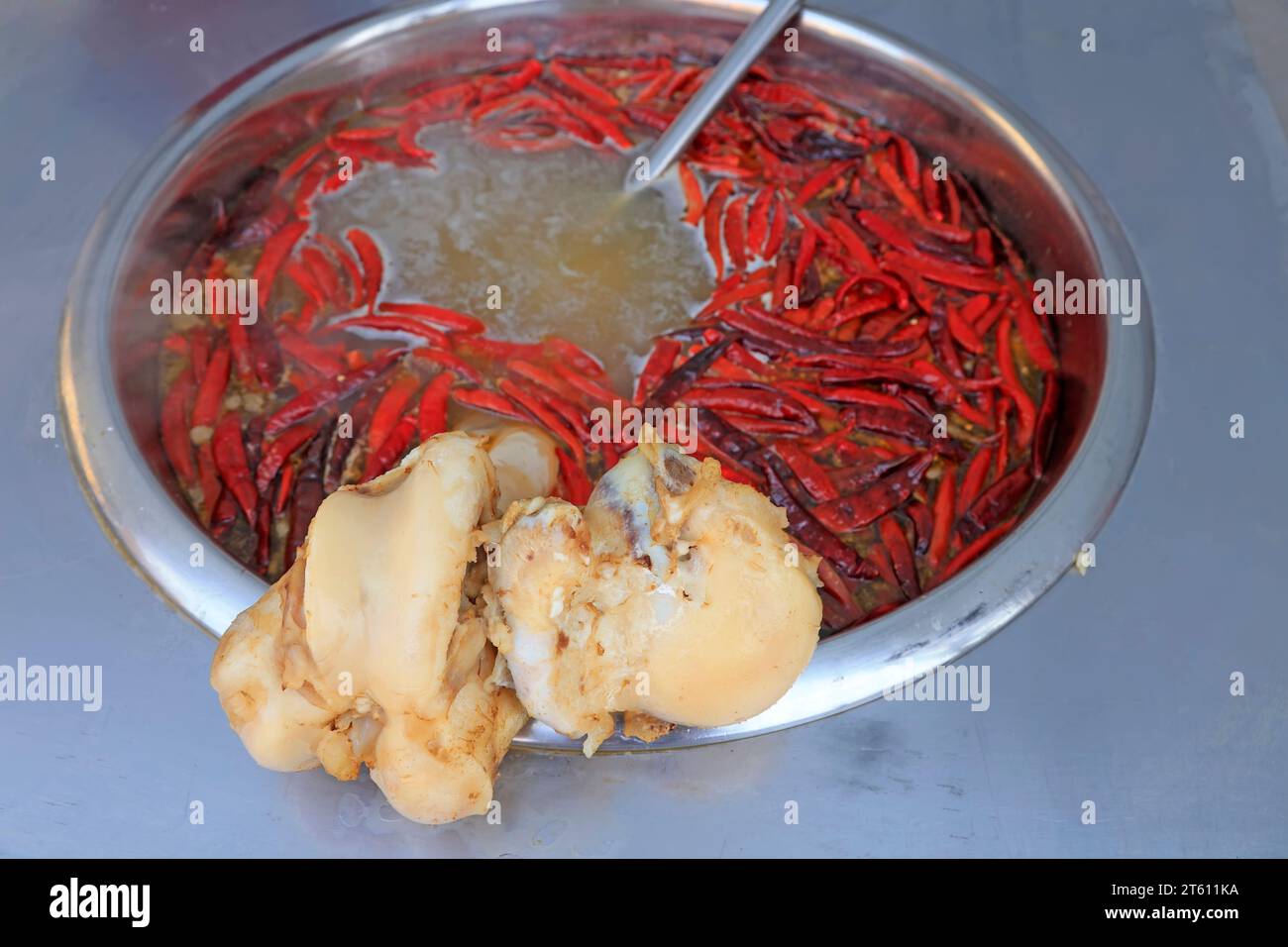 Big bone and chilli dishes Stock Photo - Alamy