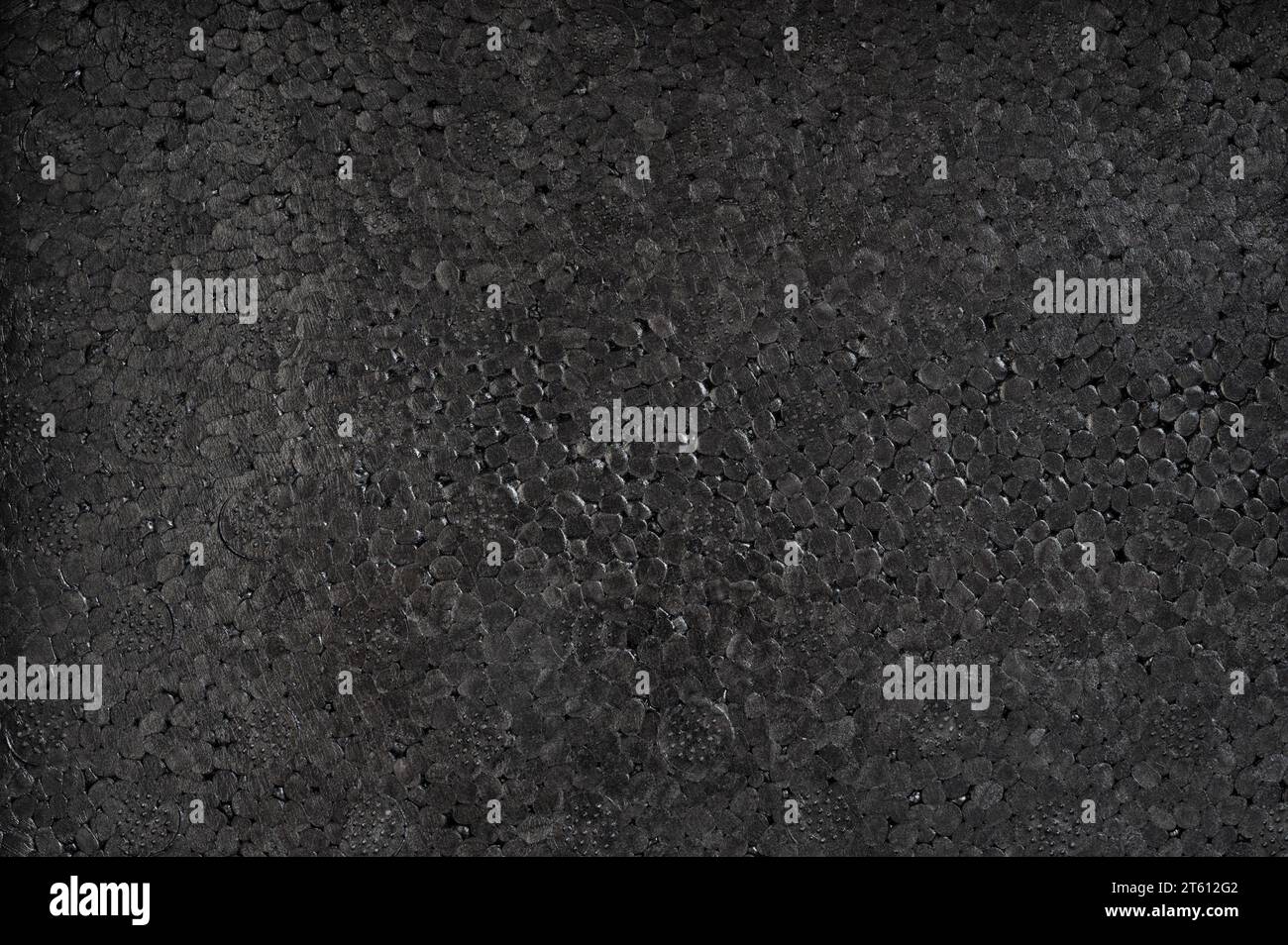 Black polystyrene packing texture background macro close up view Stock ...