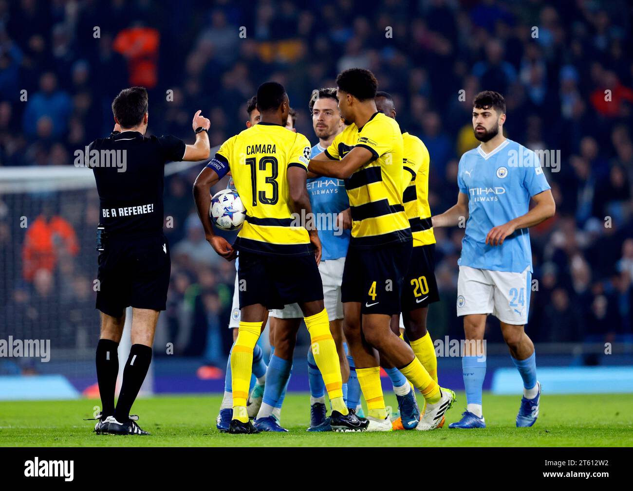 Manchester City's Jack Grealish and BSC Young Boys' Mohamed Ali Camara ...