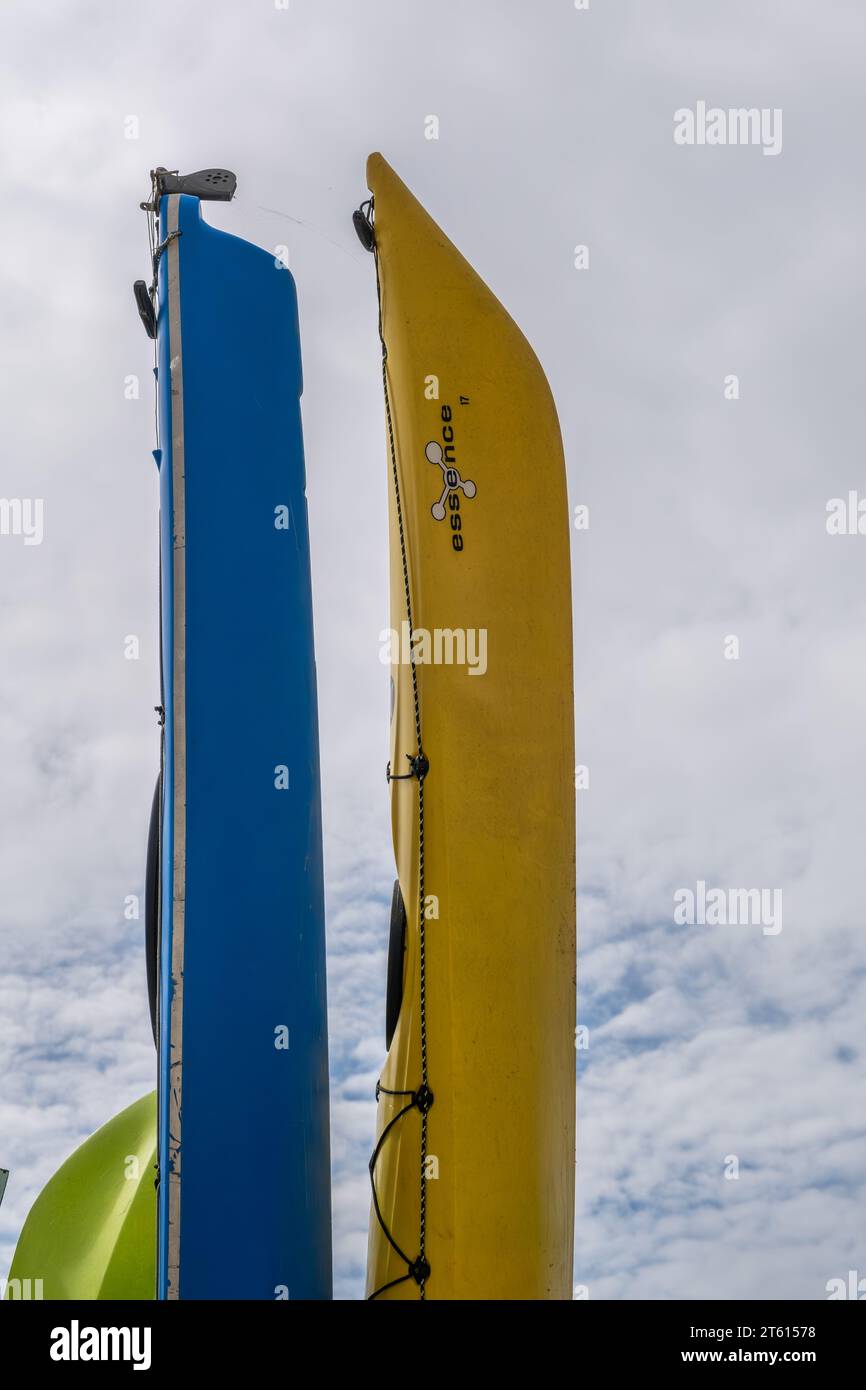 Kayaks and canoes in storage, standing on end vertically Stock Photo ...