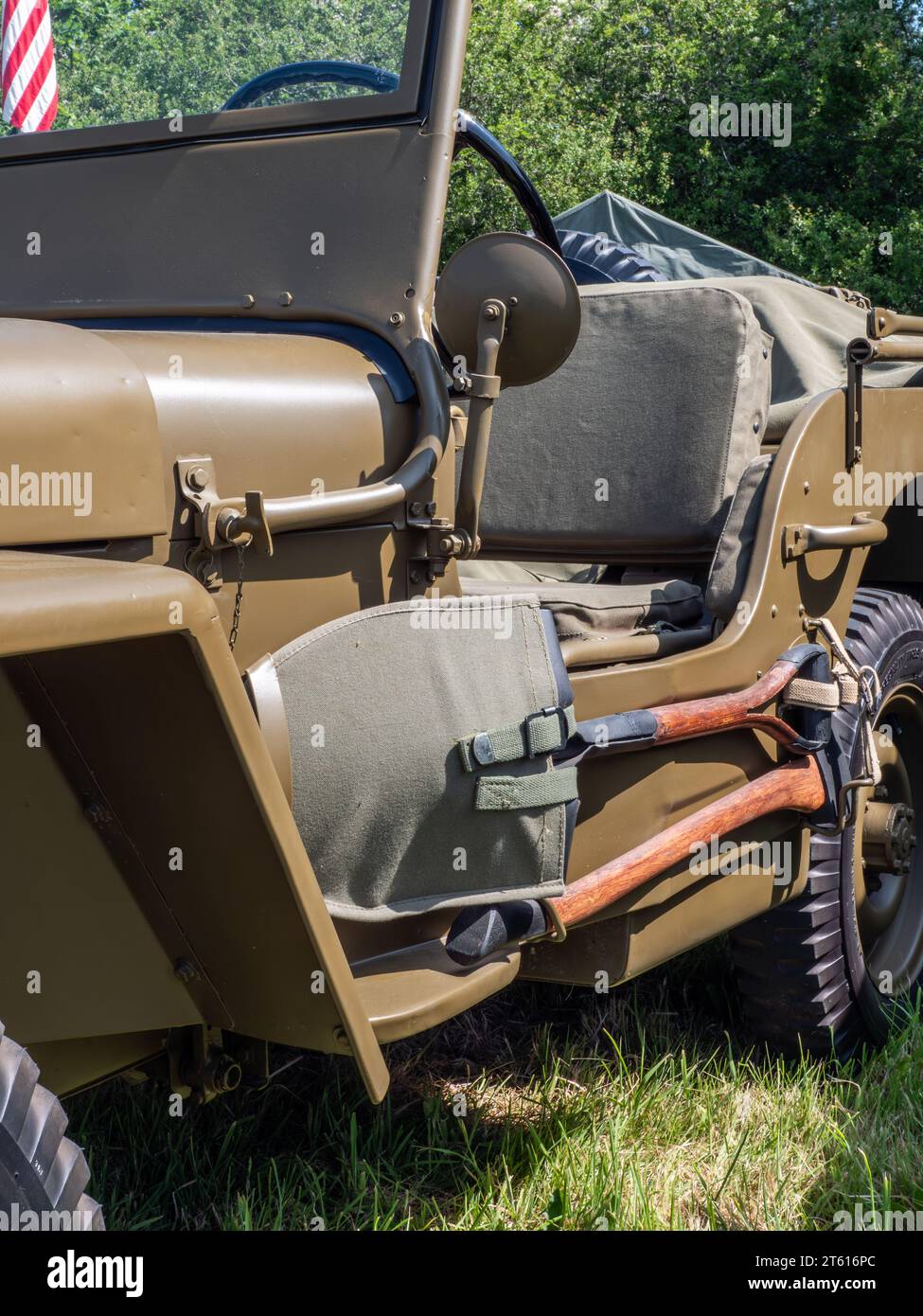 Side view view of an American military vehicle, jeep, with no door ...