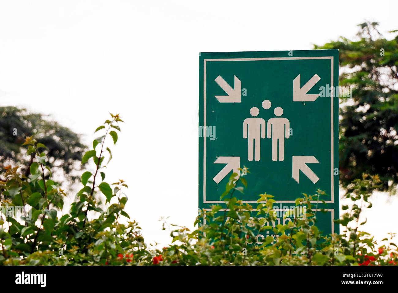 safety signs and label for fire assembly point sign Stock Photo - Alamy