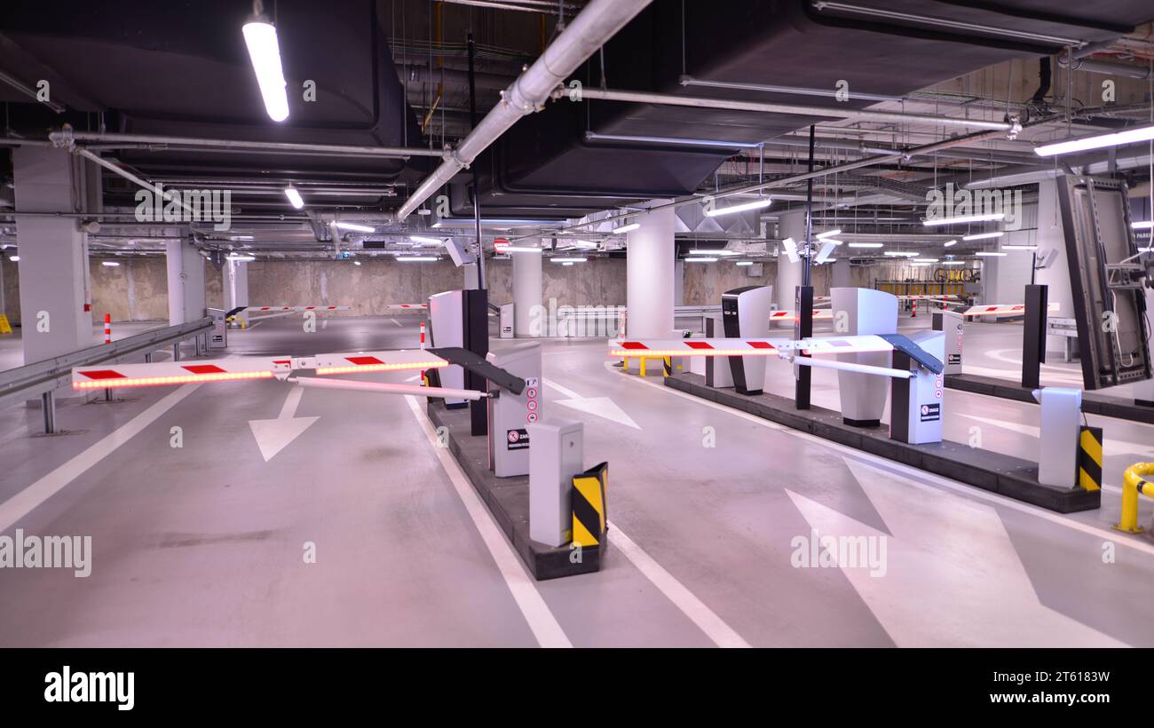 Parking lot entrance and exit. Automobile parking inside Stock Photo ...