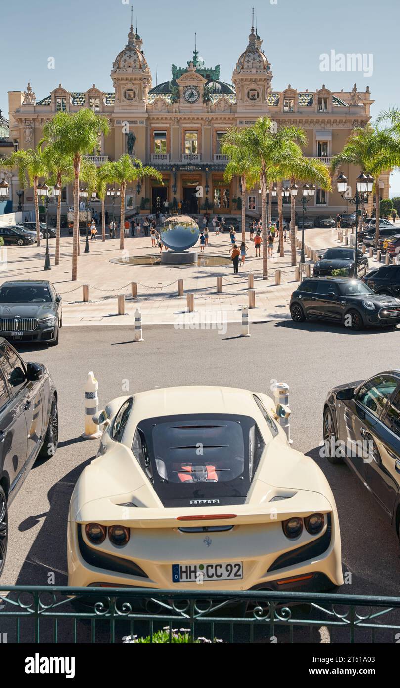 Monaco, Monte-Carlo, 22 October 2022: Square Casino Monte-Carlo at sunset, luxury cars, famous ...