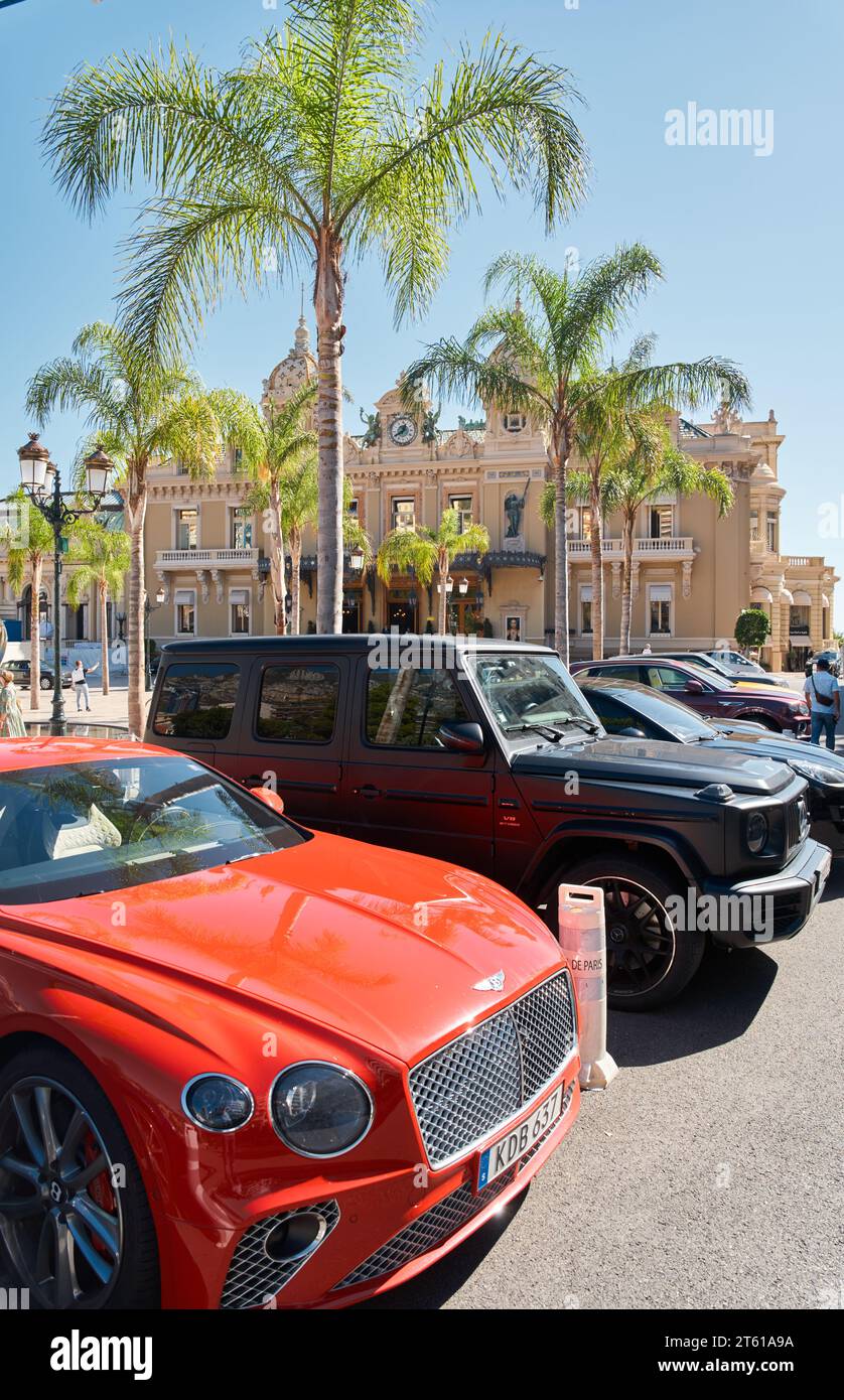 Monaco, Monte-Carlo, 22 October 2022: Square Casino Monte-Carlo at sunset, luxury cars, famous ...