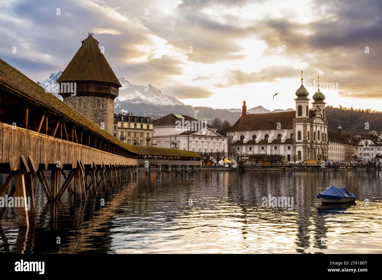 Old town of Lucerne, Switzerland at sunset in winter. Famous wooden ...