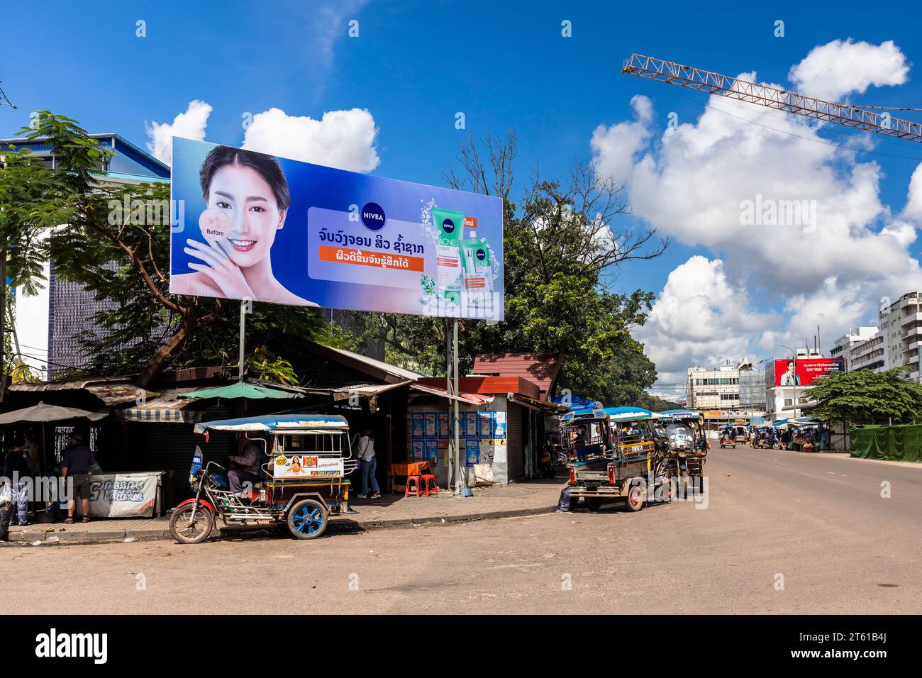 Big signbord at intersection, street of city center, Vientiane, Laos ...