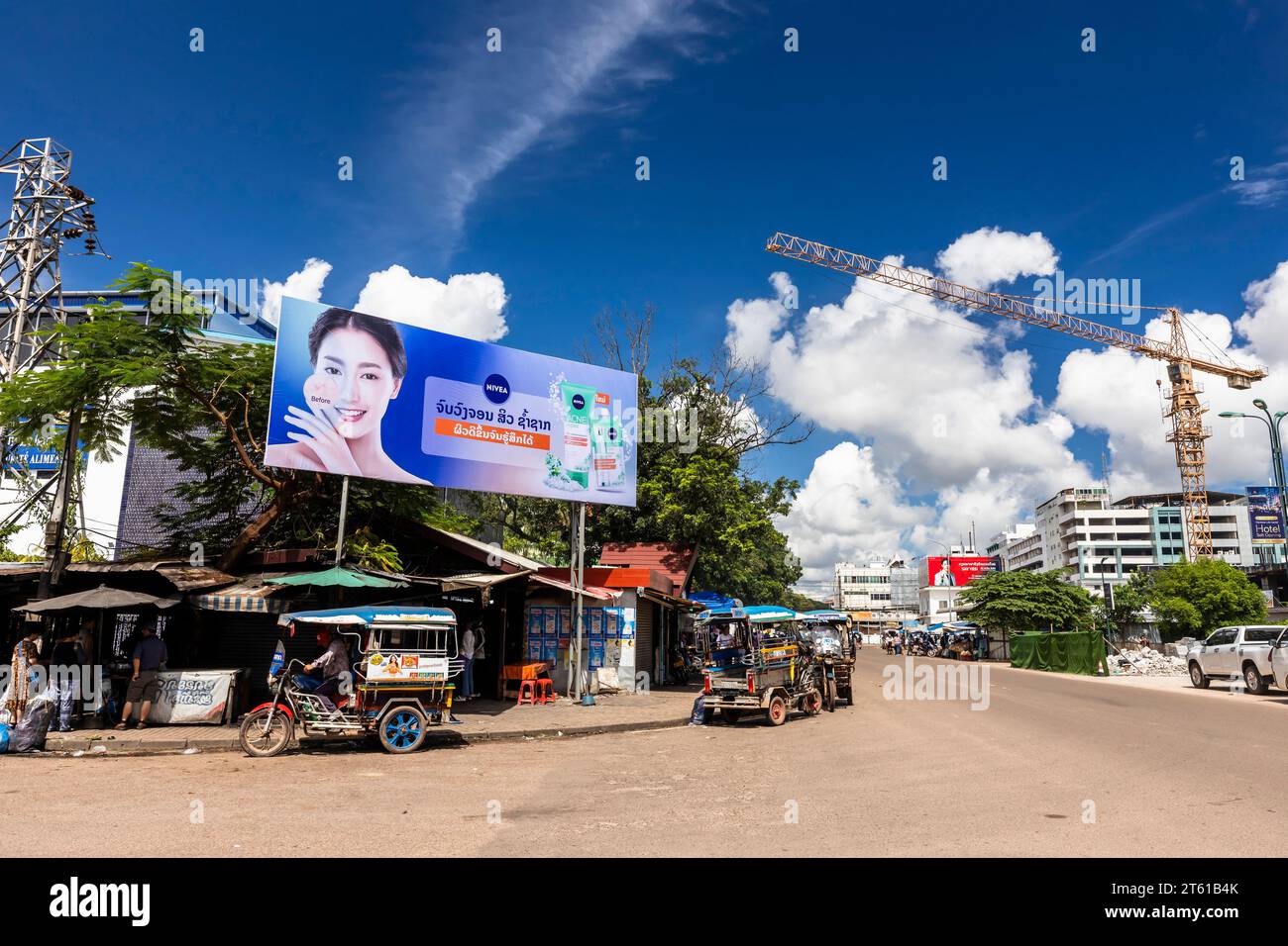 Big signbord at intersection, street of city center, Vientiane, Laos ...
