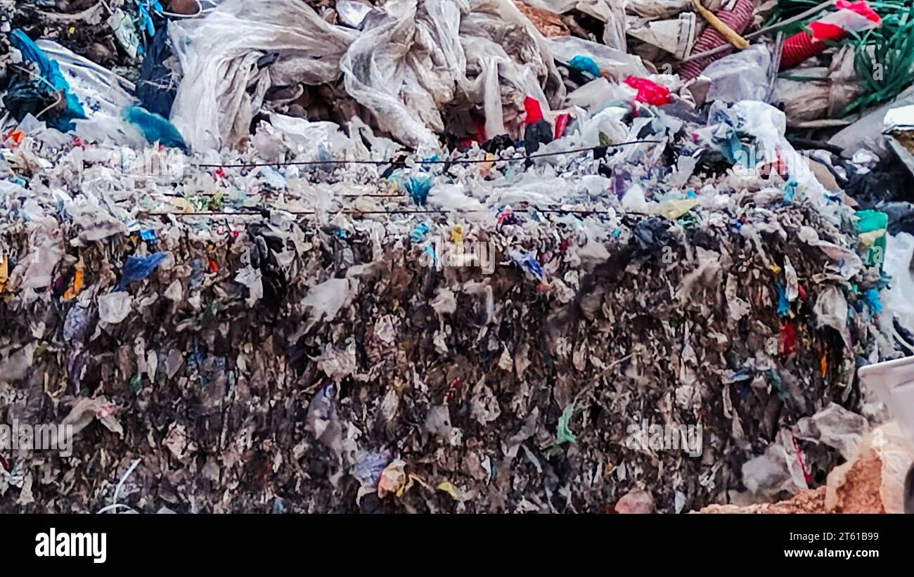 detail of a bundle of plastic waste on a mountain of garbage and waste ...