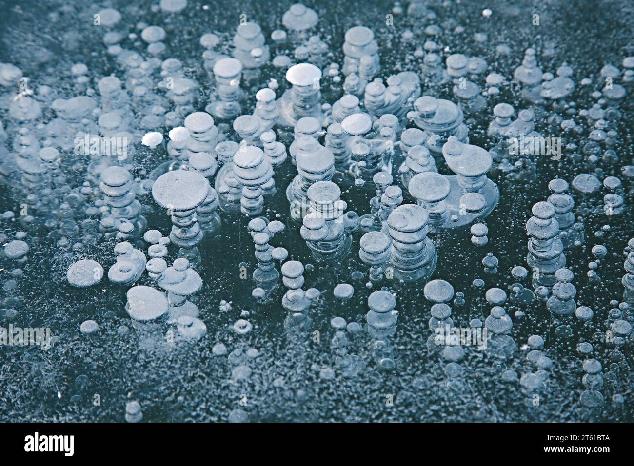 Winter ice with gas bubbles trapped inside Stock Photo - Alamy