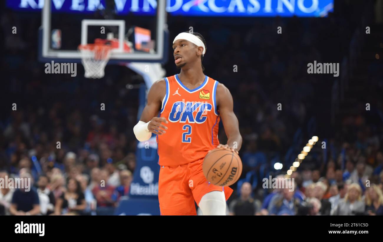 Oklahoma City Thunder guard Shai Gilgeous-Alexander pushes down the ...