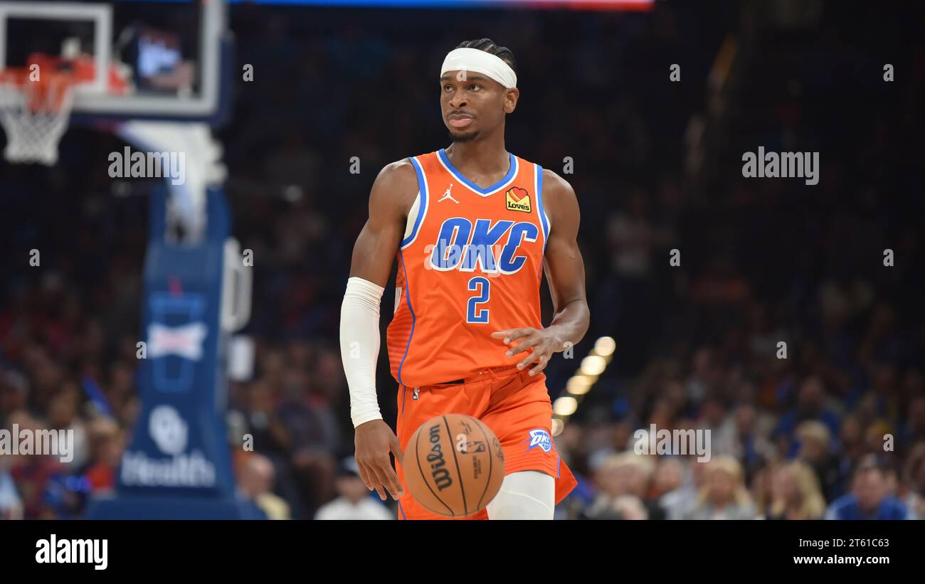 Oklahoma City Thunder guard Shai Gilgeous-Alexander pushes down the ...