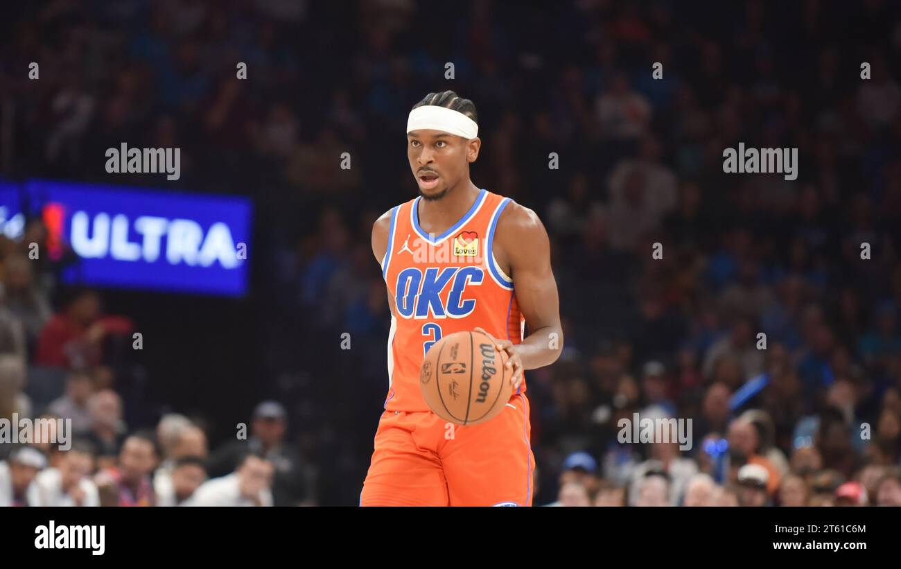 Oklahoma City Thunder guard Shai Gilgeous-Alexander pushes down the ...