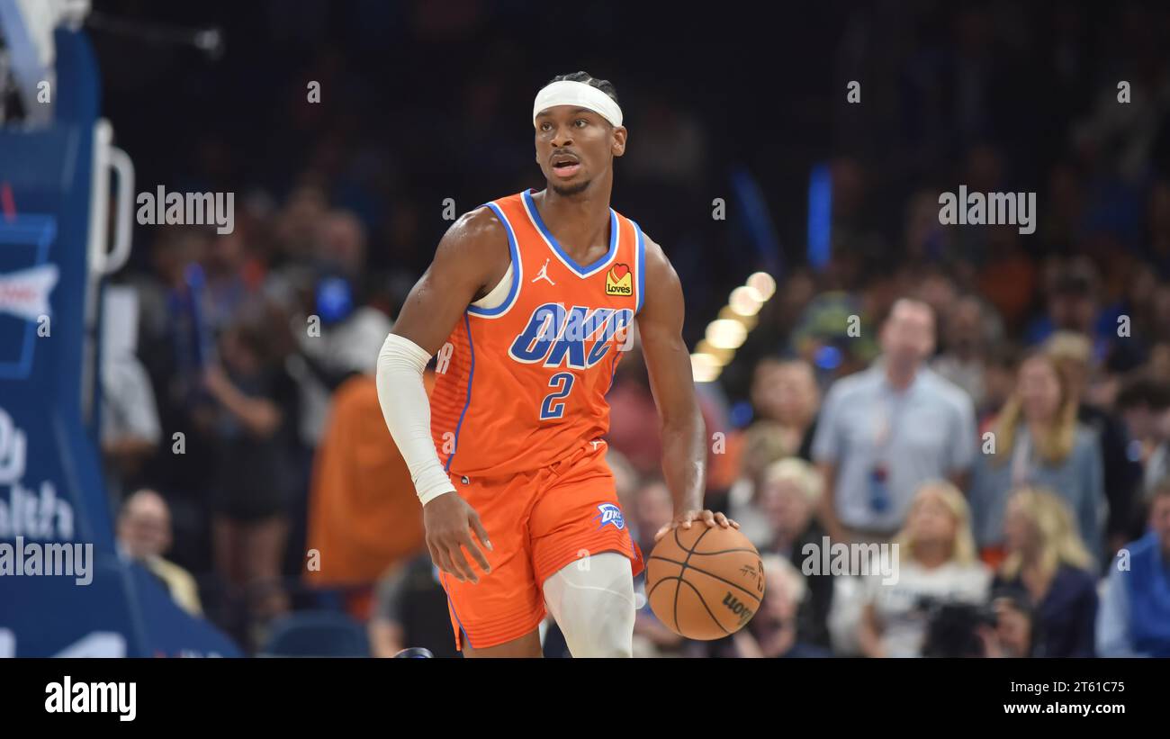 Oklahoma City Thunder guard Shai Gilgeous-Alexander pushes down the ...