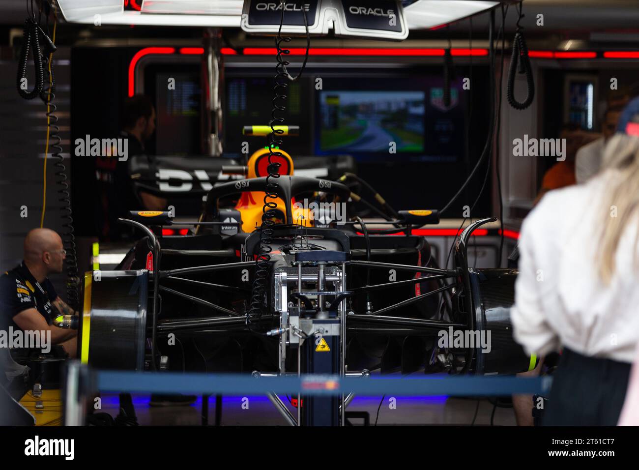 MECHANICS working on the ORACLE RED BULL RACING car at the garage as part of the 2023 F1 Sao ...