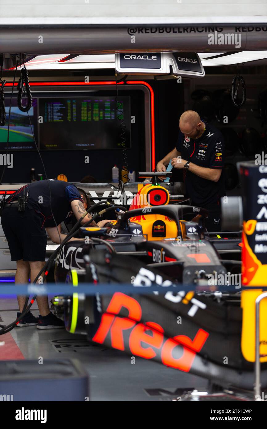 MECHANICS working on the ORACLE RED BULL RACING car at the garage as part of the 2023 F1 Sao ...